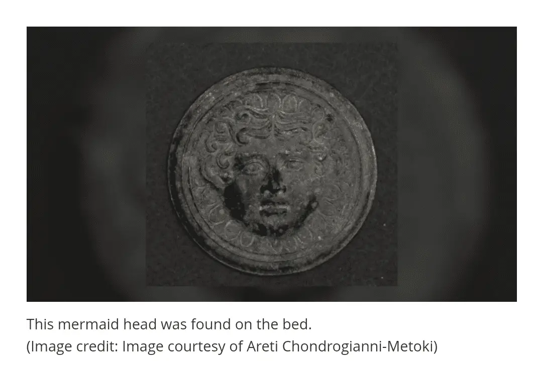 2,100-year-old burial of woman lying on bronze 'mermaid bed' unearthed ...
